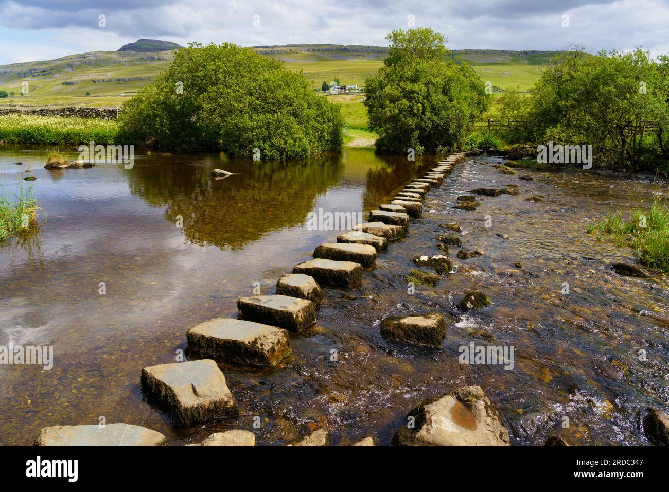 Impressive view across the River Doe stepping stones with The ...