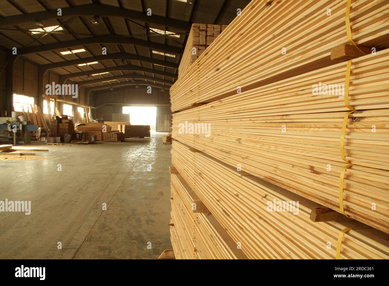 Wood timber construction material. Pile of construction timber at the ...