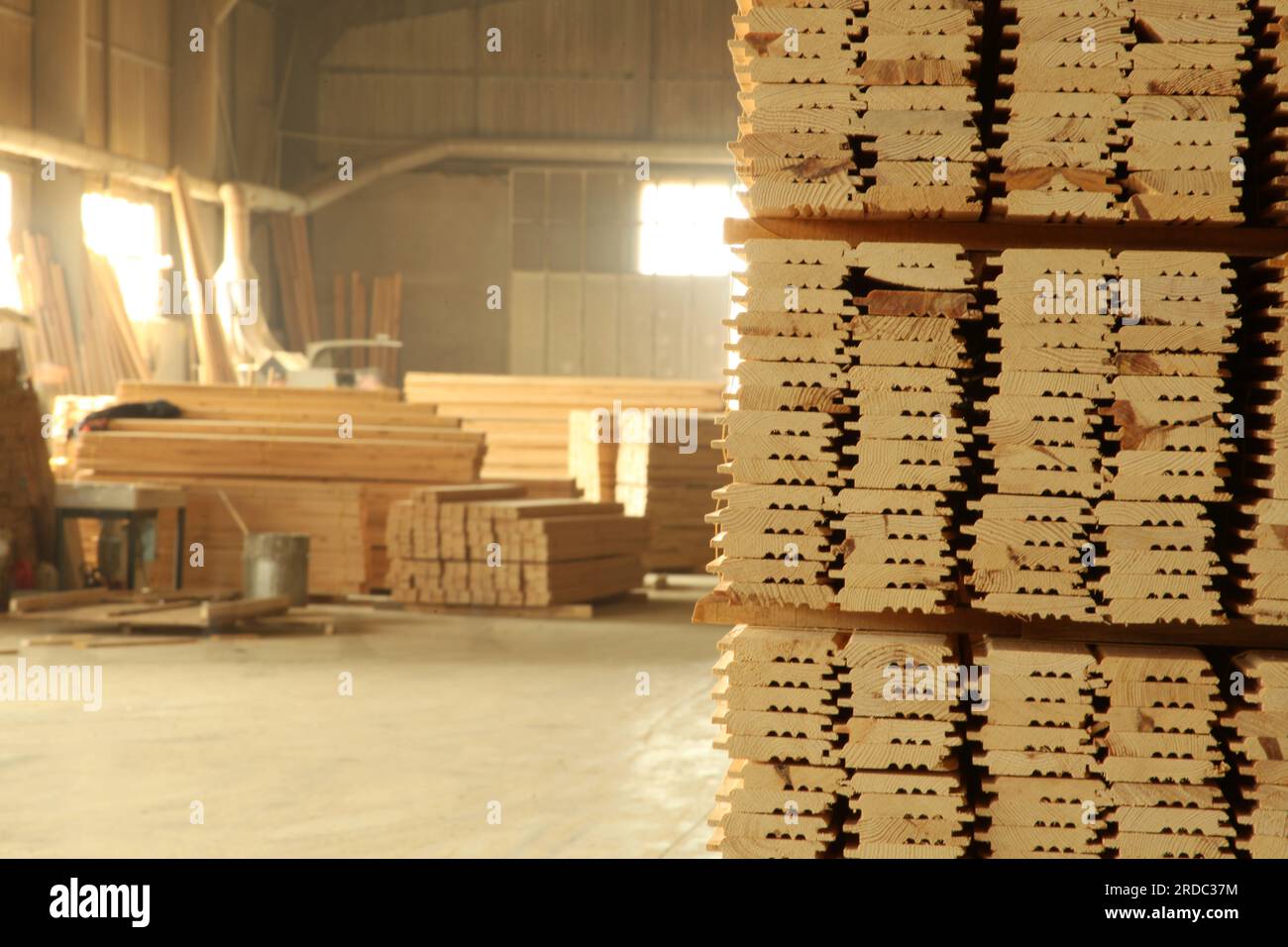 Wood timber construction material. Pile of construction timber at the ...