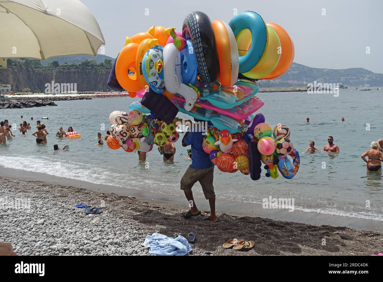 Beach toy vendor, Amalfi coast, Italy Stock Photo - Alamy