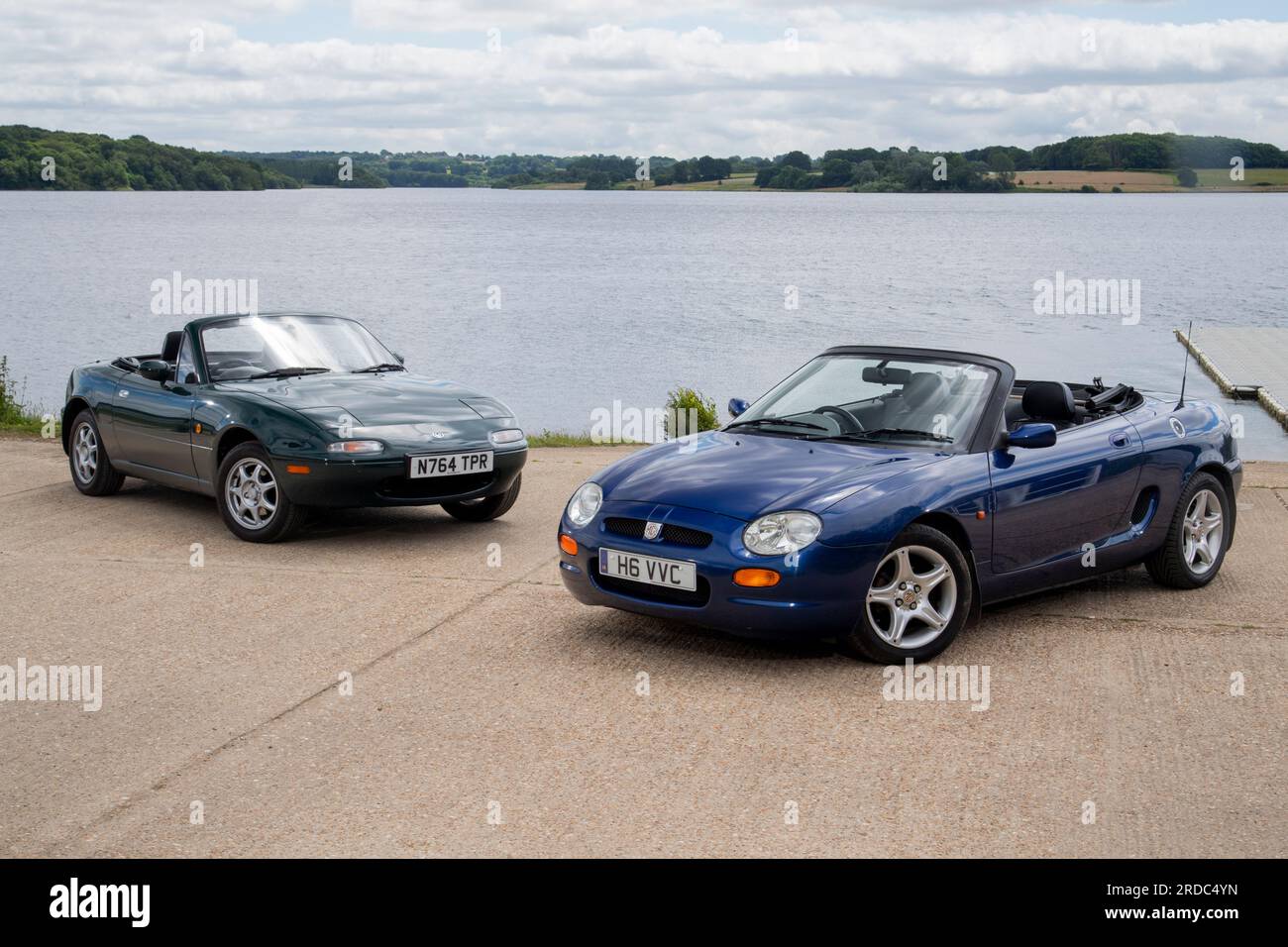 MGF and Mk1 Mazda MX5 open top sports cars Stock Photo - Alamy