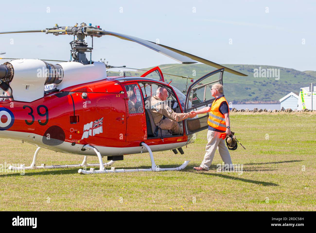 Helicopter pilot sat in a helicopter Stock Photo - Alamy