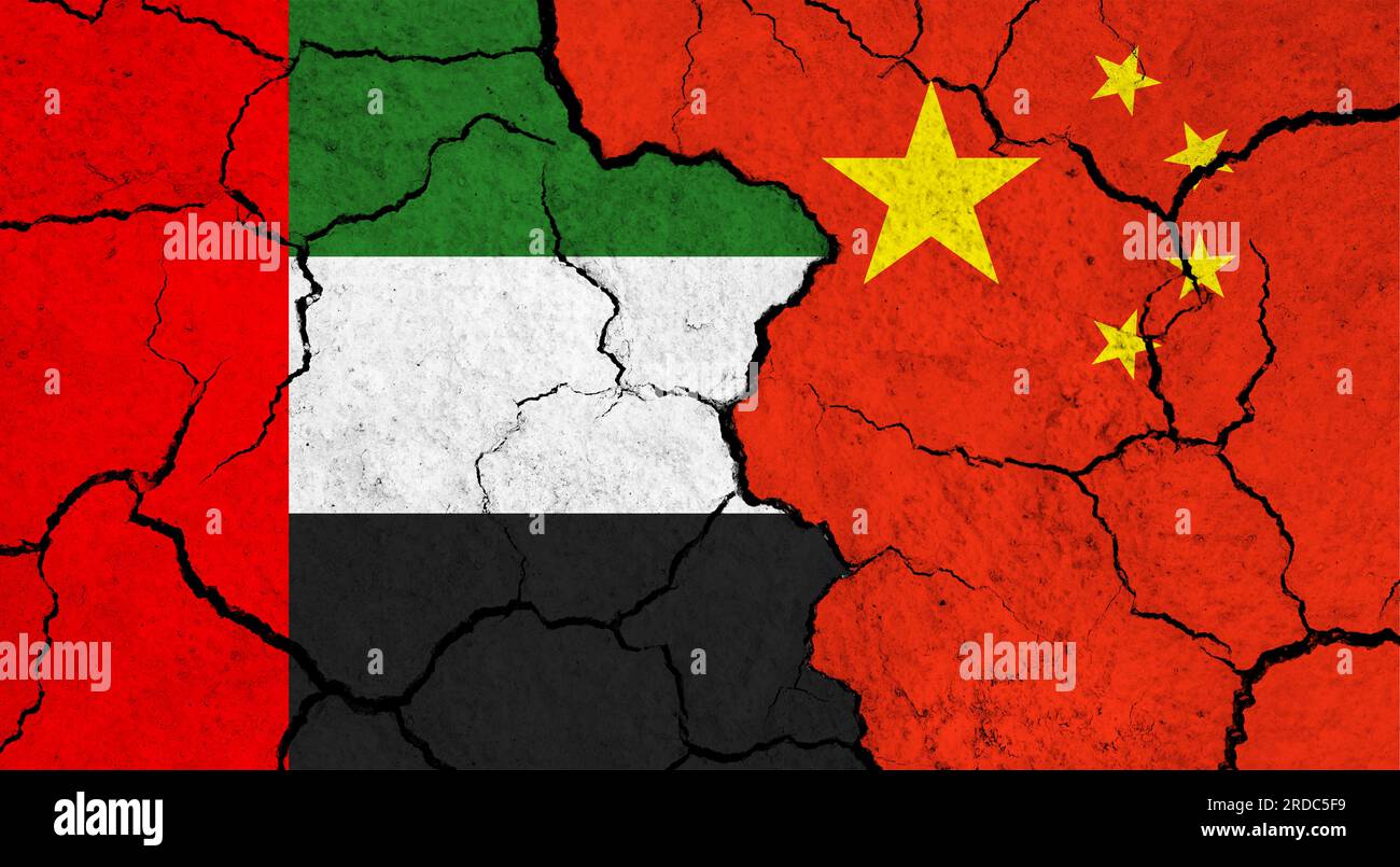 Flags of United Arab Emirates and China on cracked surface - politics ...