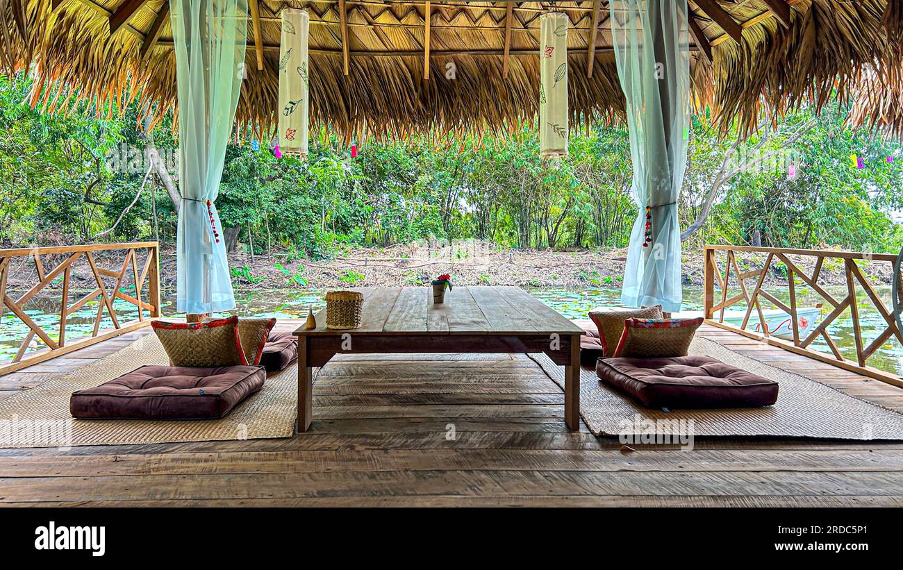 Wooden table and chairs in the garden,Thailand, Asia Stock Photo - Alamy