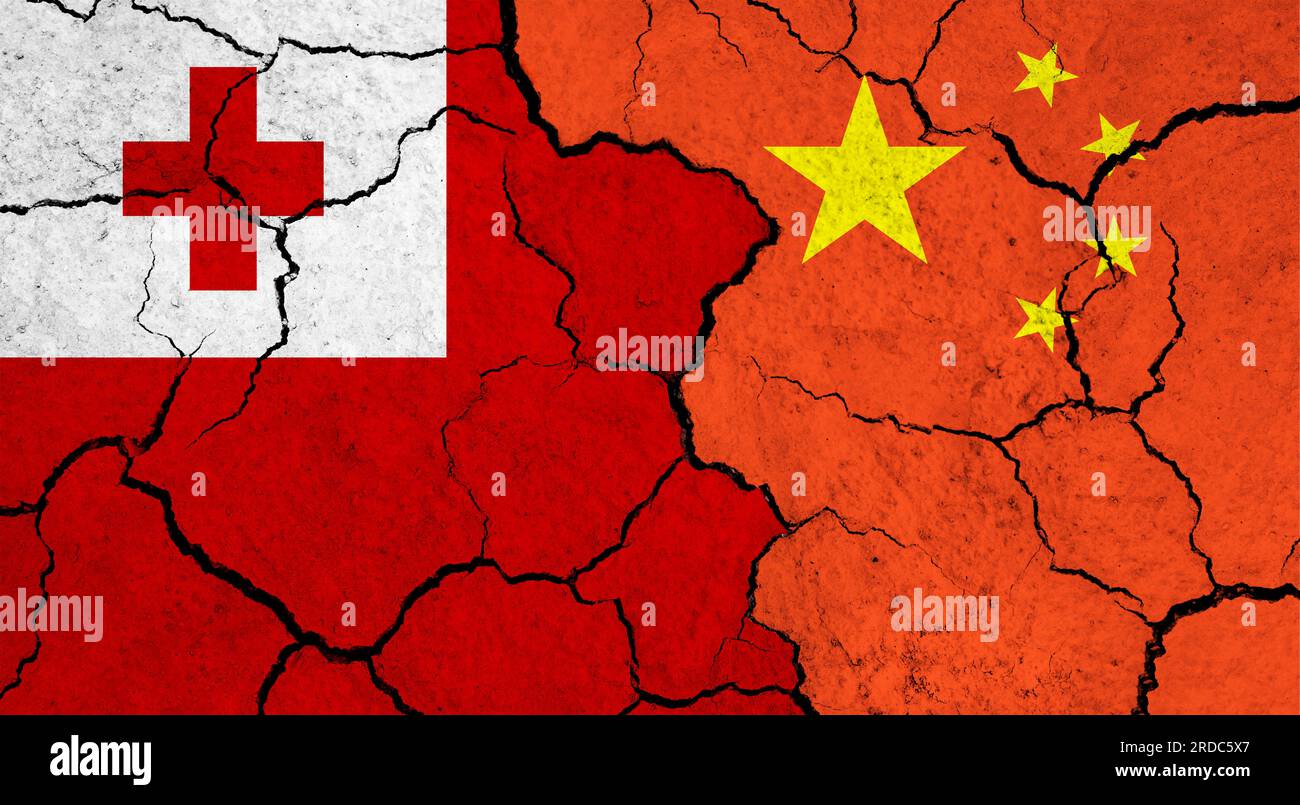 Flags of Tonga and China on cracked surface - politics, relationship ...