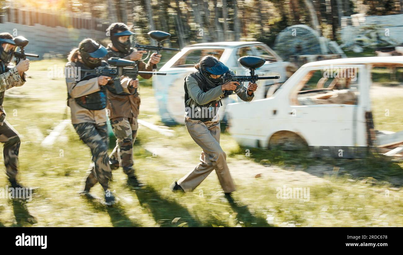 Teamwork, challenge and paintball with man in game for playground, war ...