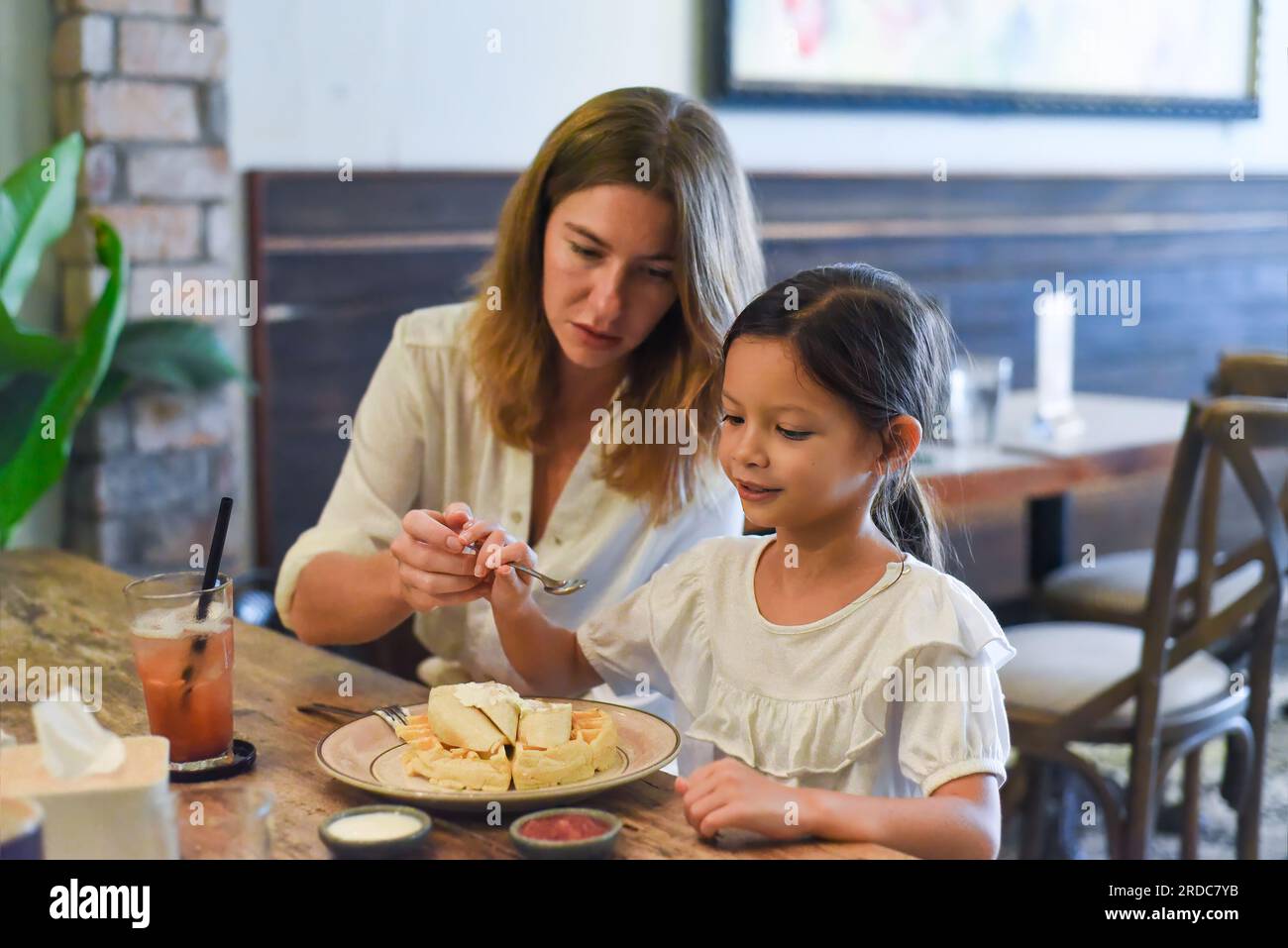 Hungry child mother hi-res stock photography and images - Alamy