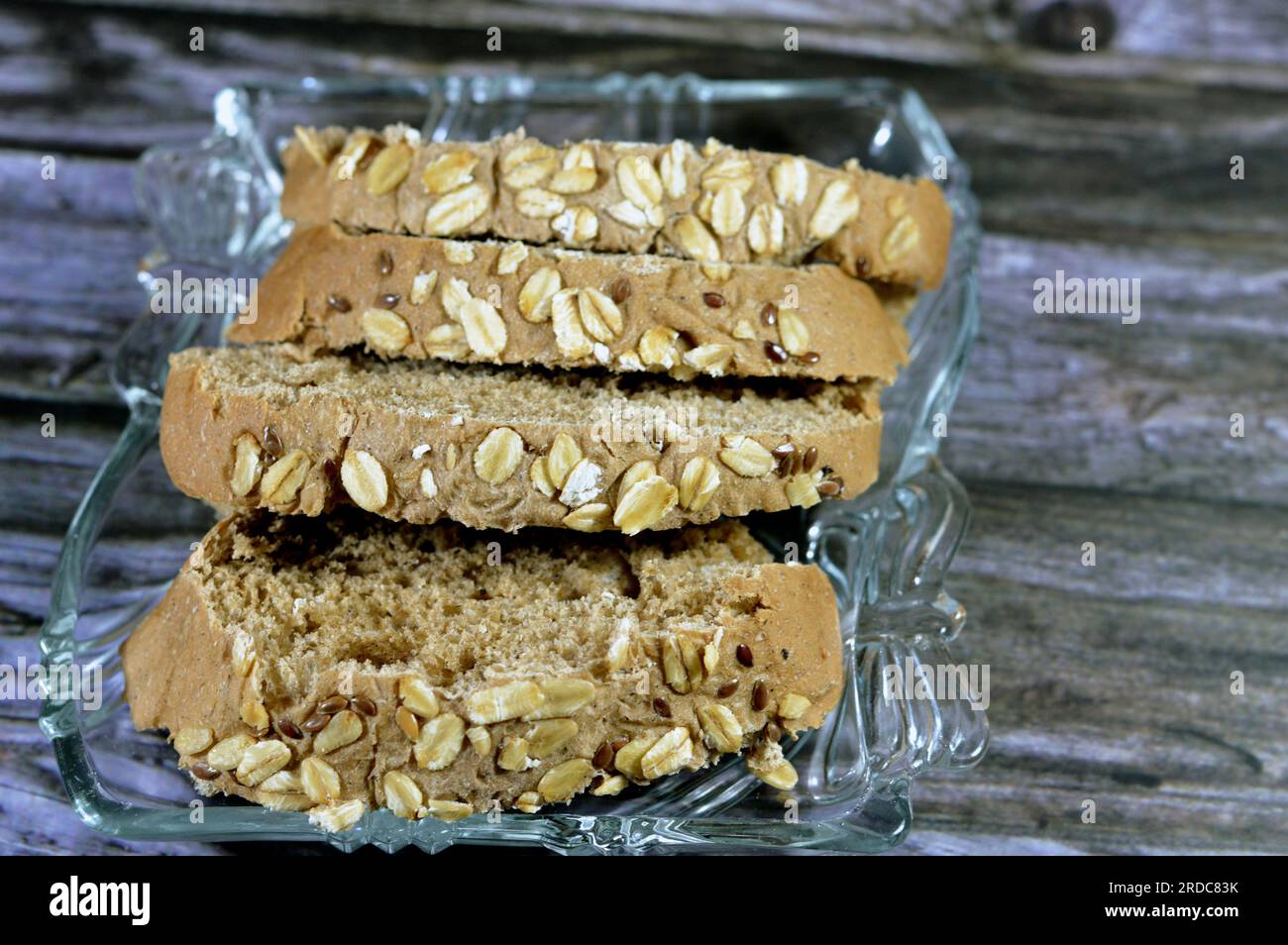 wheat oat fresh baked pieces bun cut topped with oats and sesame, The ...