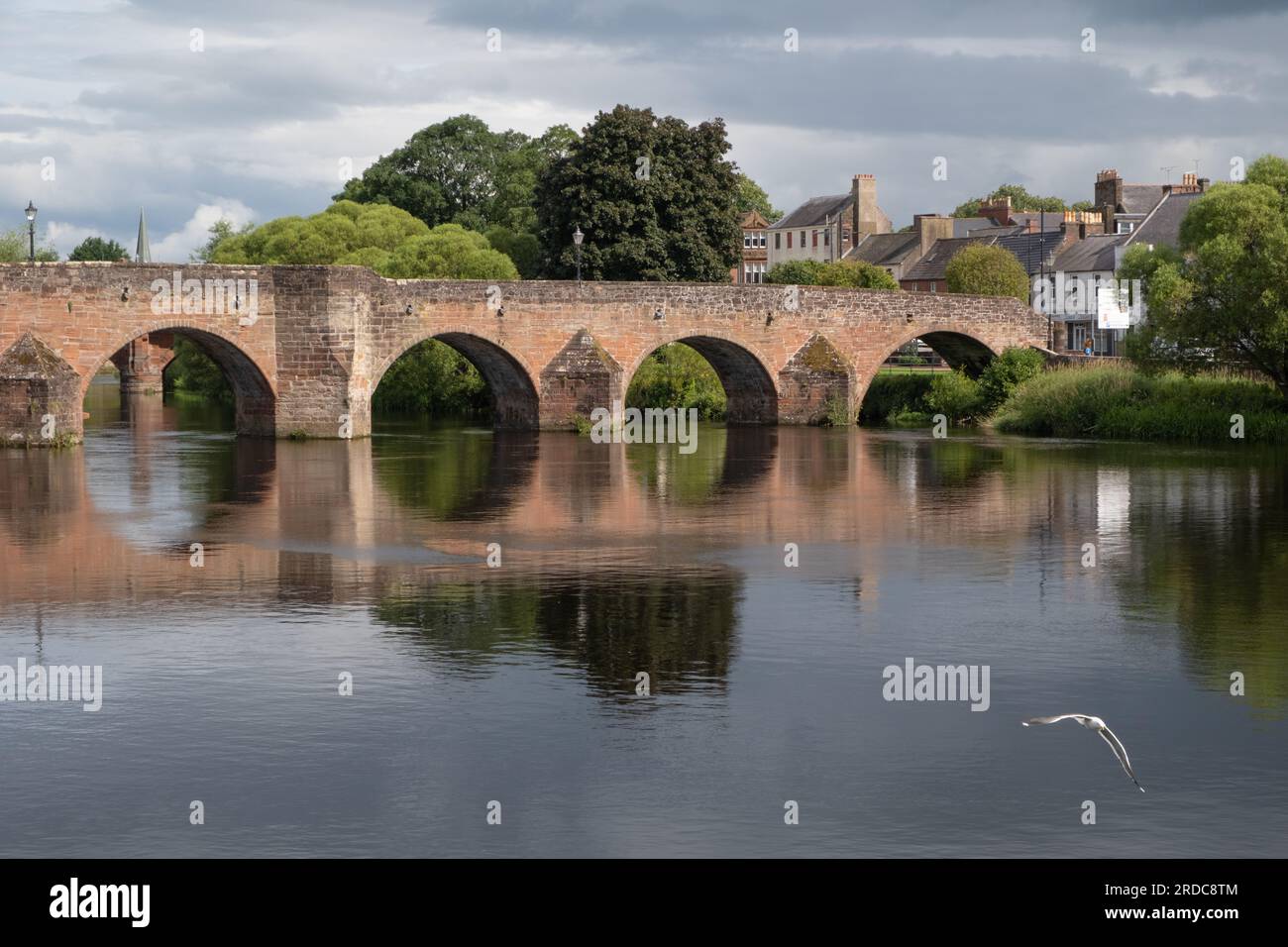A view of the Devorgilla Bridge and River Nith in the centre of ...