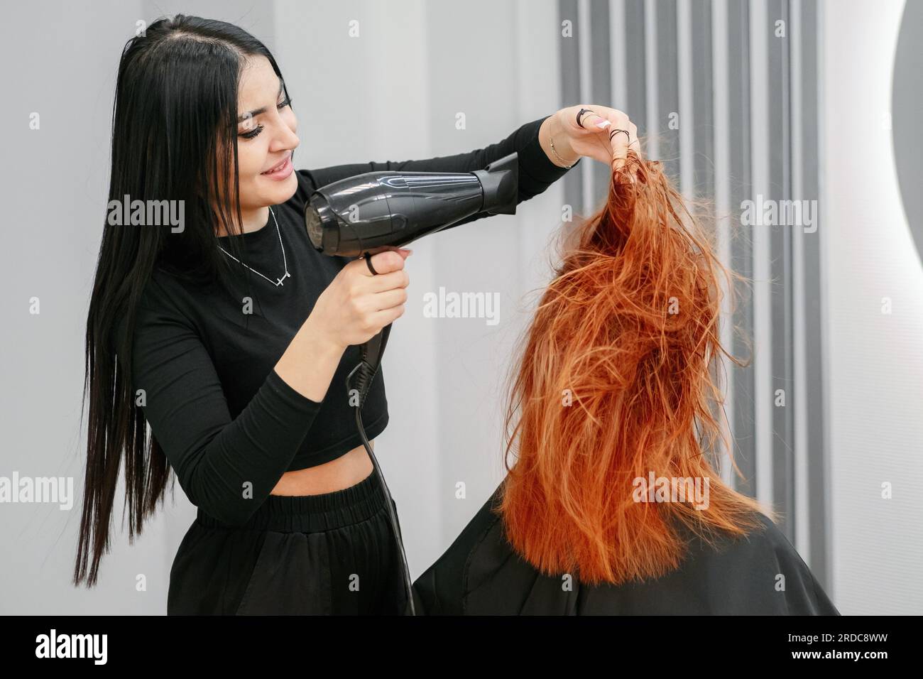 Female hairdresser works hi-res stock photography and images - Alamy