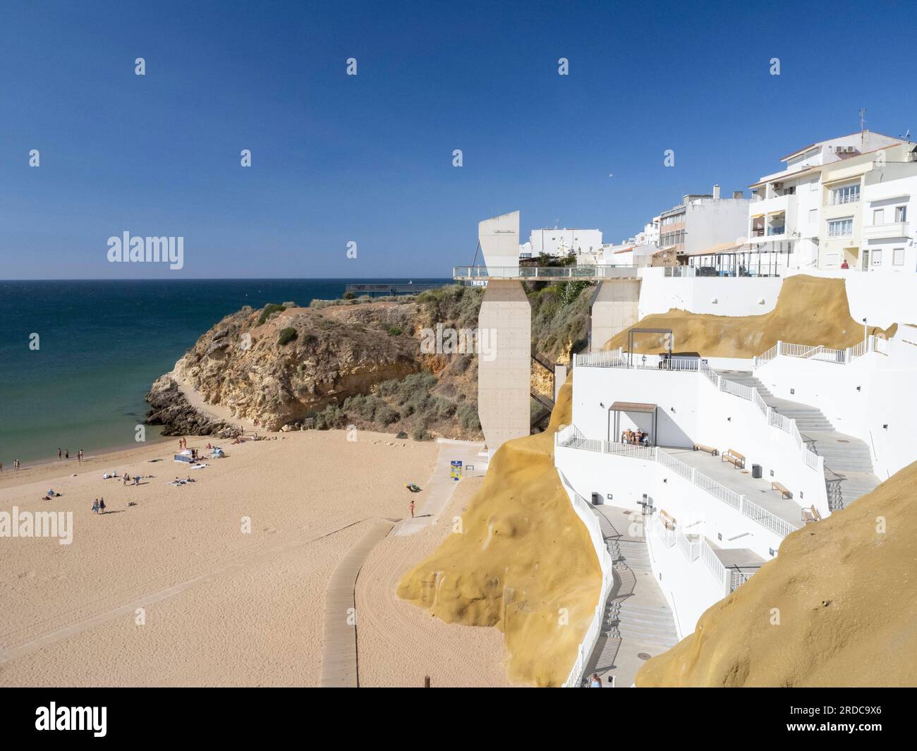 Praia do Peneco beach lift and steps Albufeira Algarve Portugal Stock ...