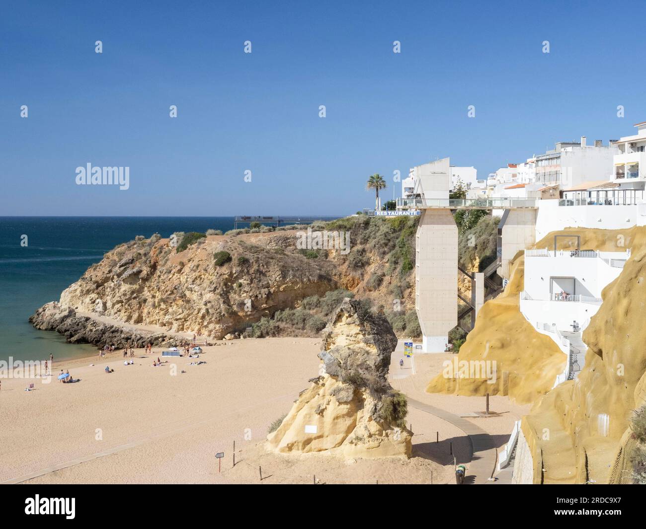 Praia do Peneco beach lift and steps Albufeira Algarve Portugal Stock ...