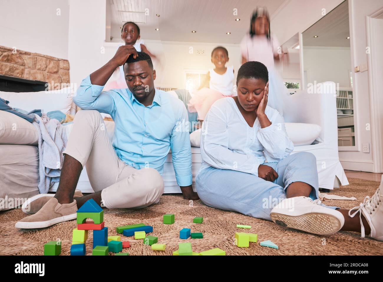 Home, family and parents with stress, frustrated and playing in living ...