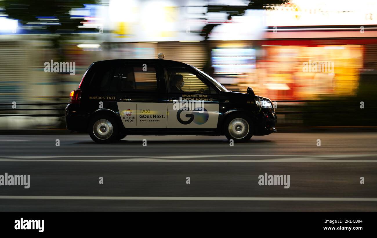 Fast Japanese Taxi on the Streets of Tokyo Stock Photo - Alamy