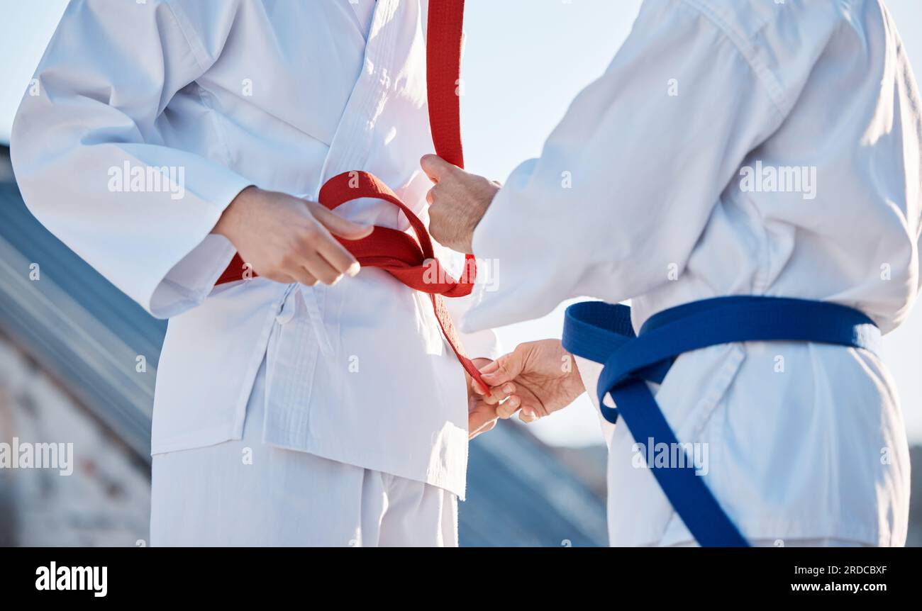 Karate, belt and people outdoor for training, workout or fitness ...