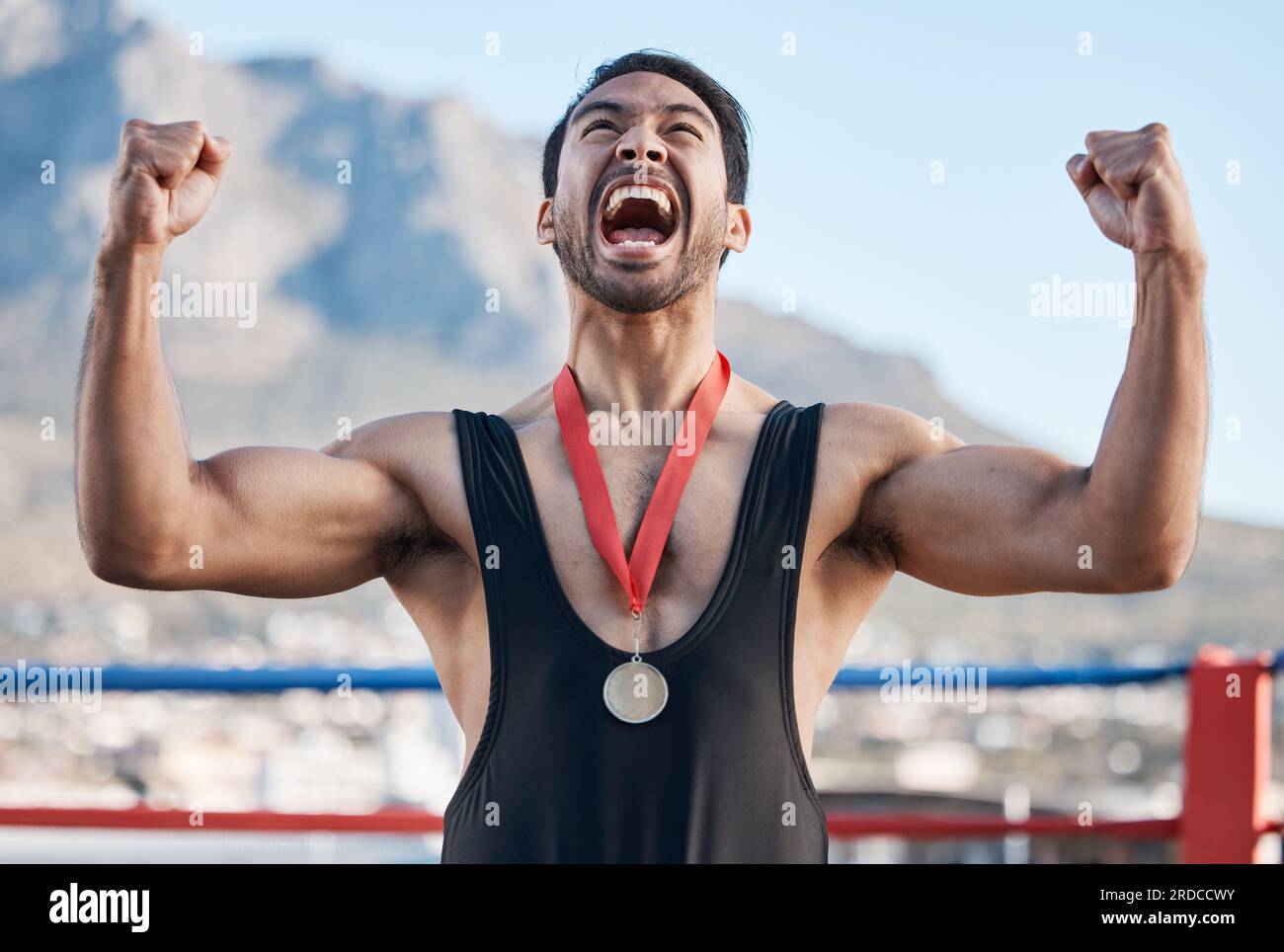 Winner man, wrestling medal and celebration with scream, success and ...