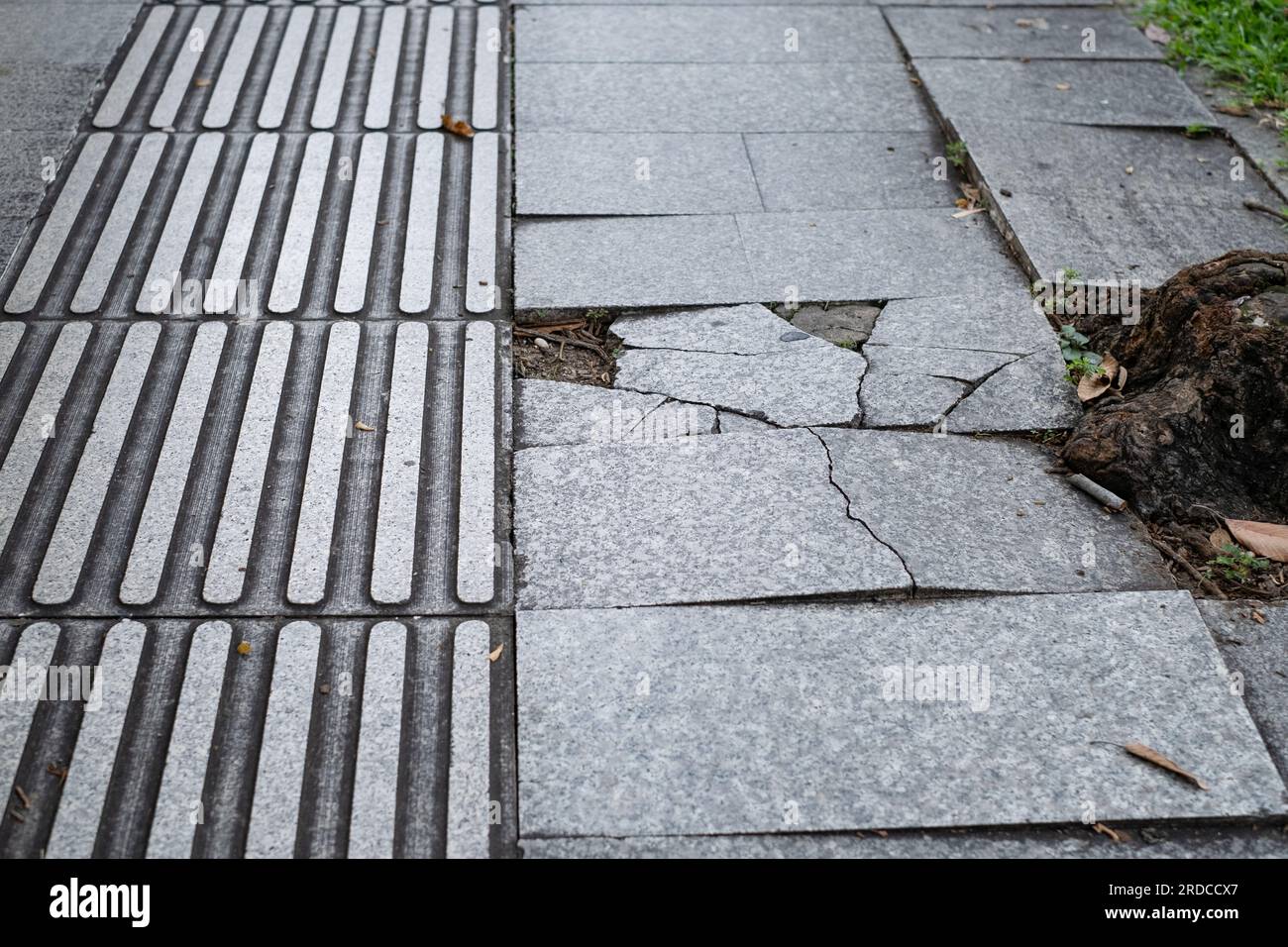 Damaged pavement in Ho Chi Minh City, Vietnam Stock Photo - Alamy