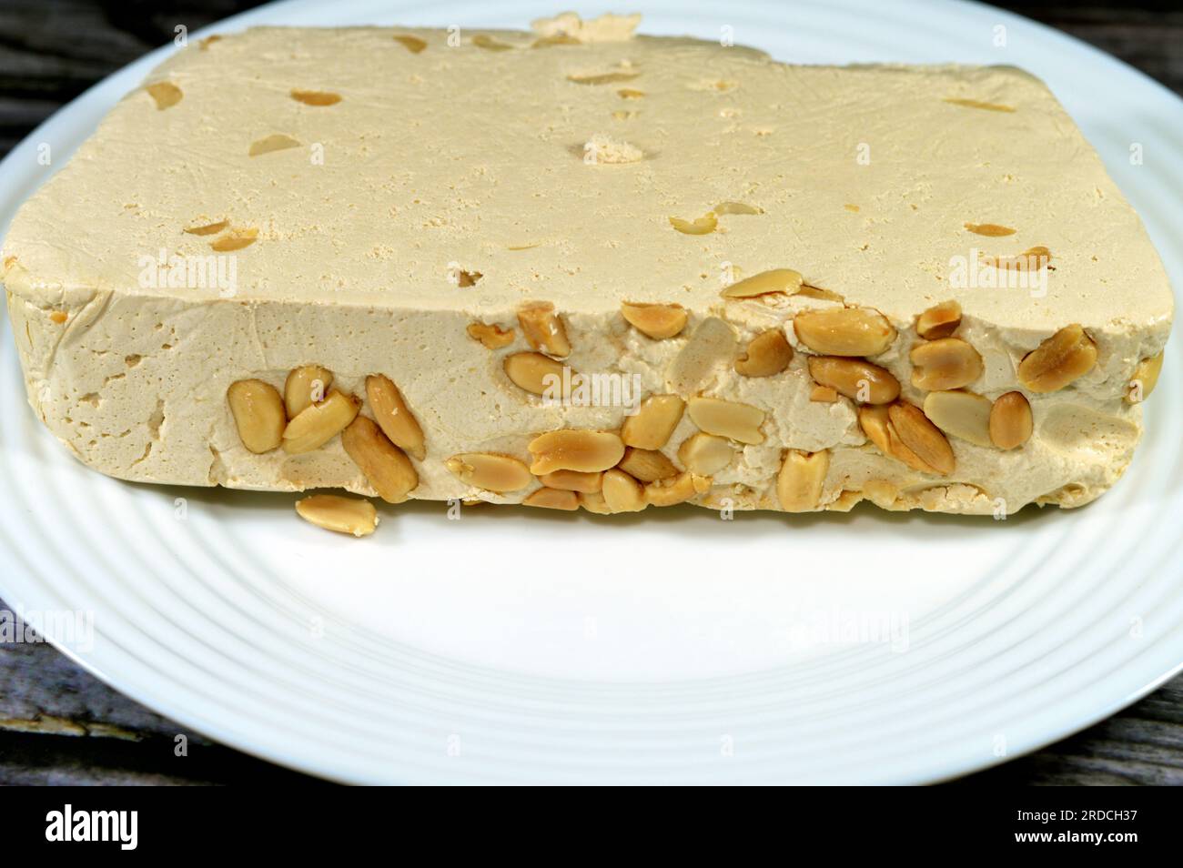 Traditional tahini halva with peanuts or Halawa Tahiniya, the primary ...