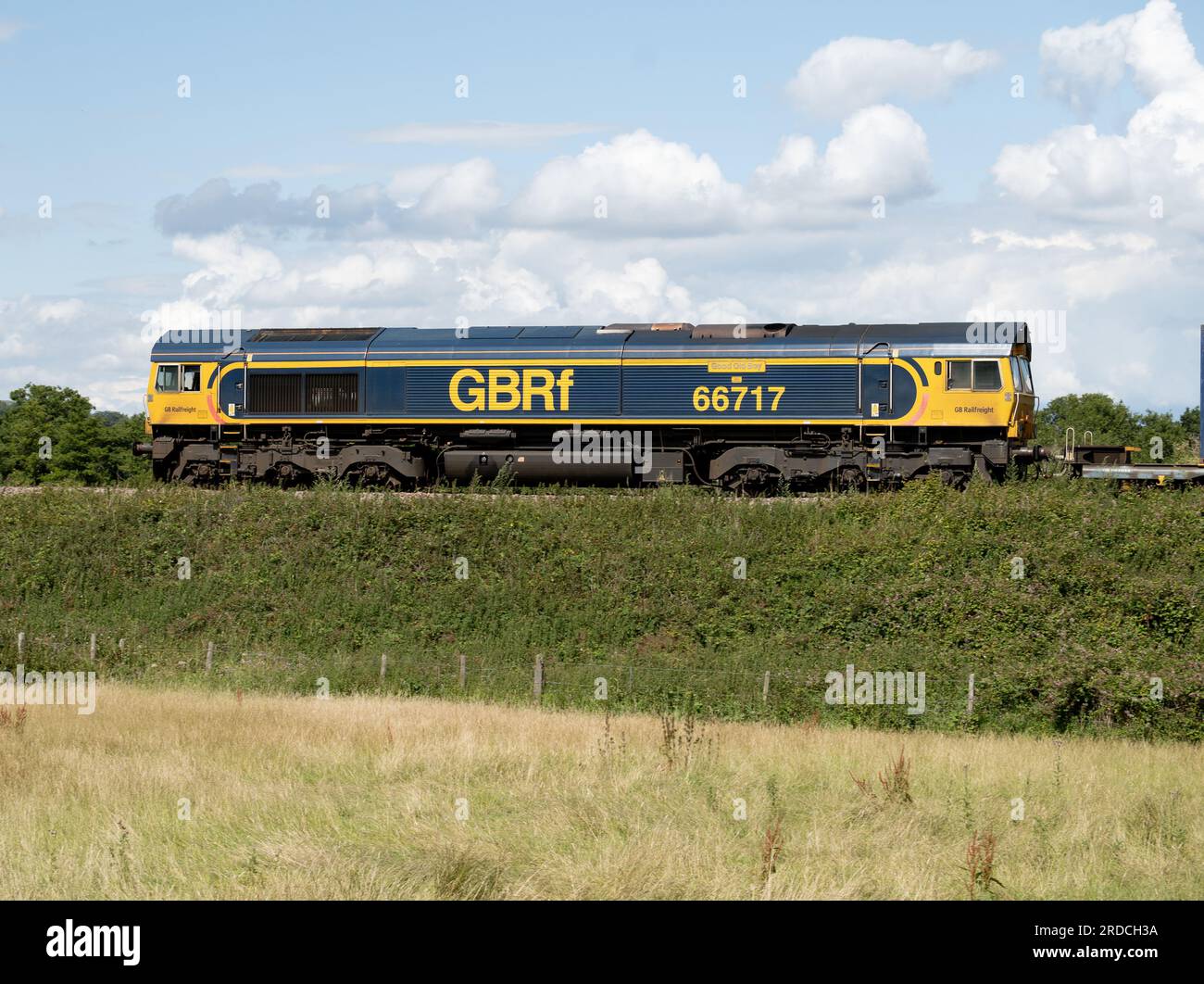 GBRf class 66 diesel locomotive No. 66717 "Gool Old Boy" pulling a ...