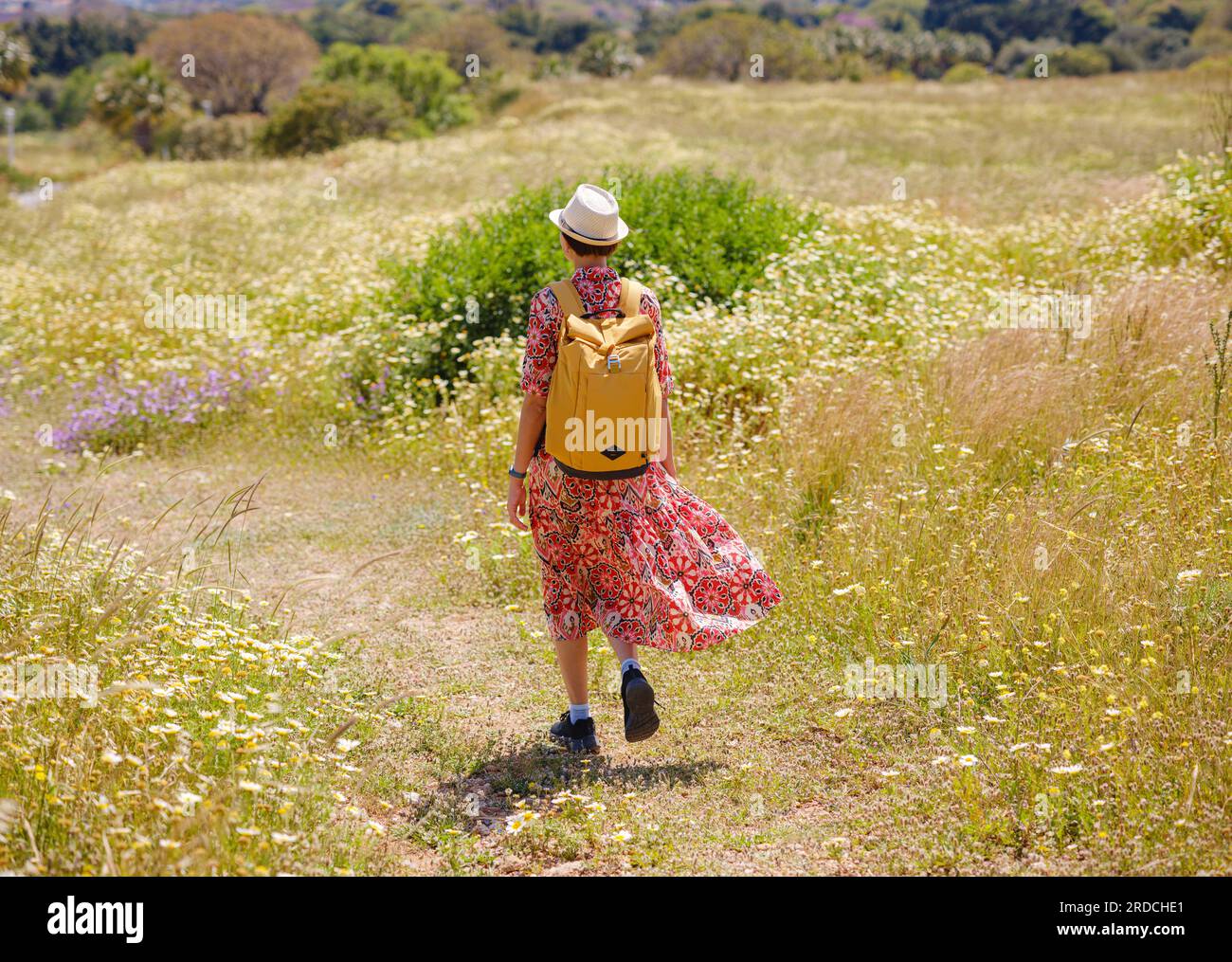 summer trip to Rhodes island, Greece. Young Asian woman in ethnic red ...