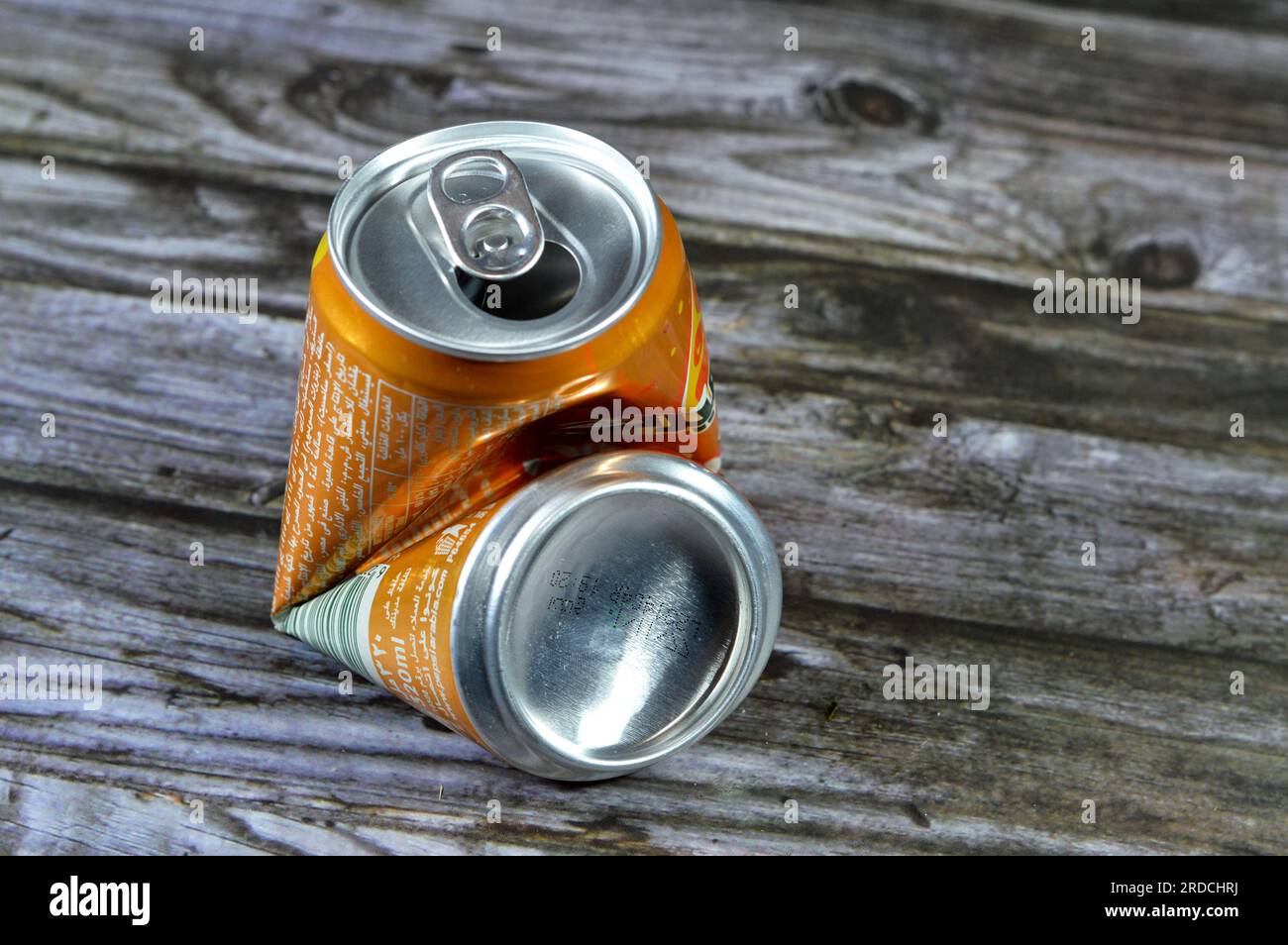 Cairo, Egypt, July 11 2023: crushed, dented aluminum can Mirinda Orange ...