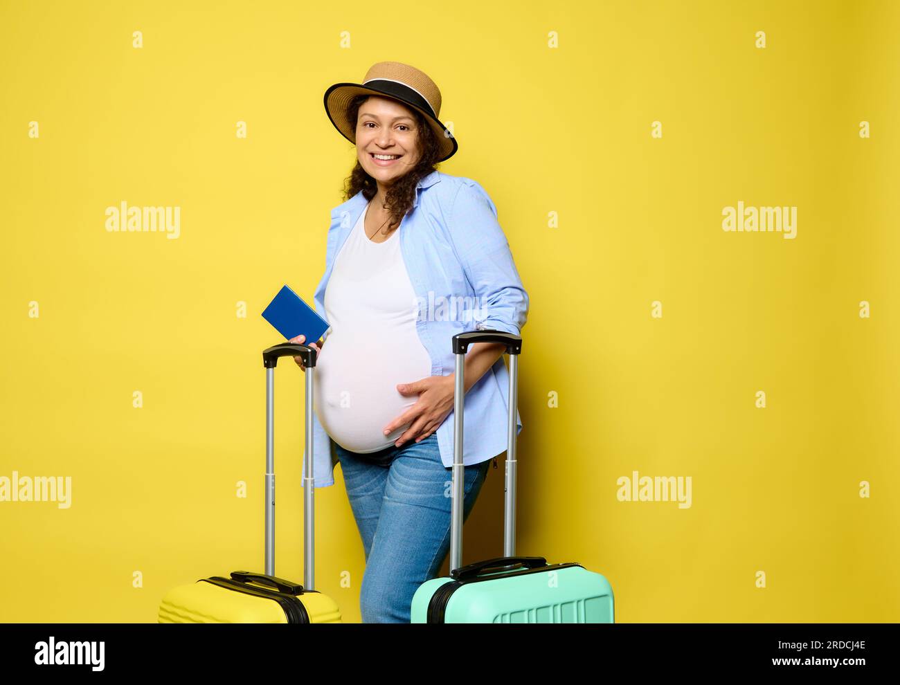 Beautiful Pregnant Woman Smiles At Camera Touches Her Belly Holding A