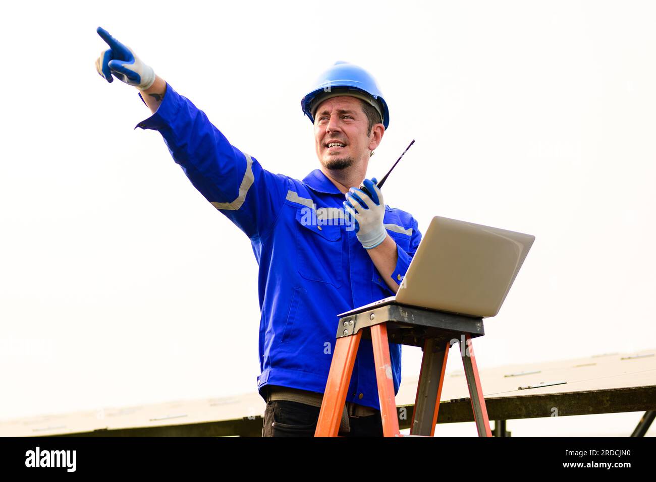 Engineer technician checking solar panels on solar power plant Stock ...
