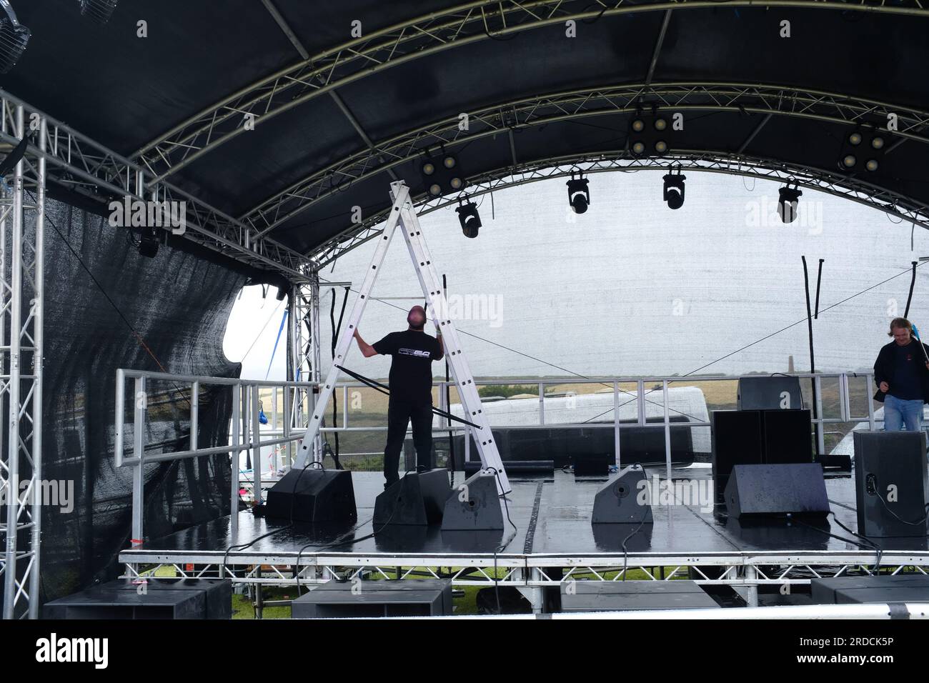 Rigging a festival stage Stock Photo - Alamy