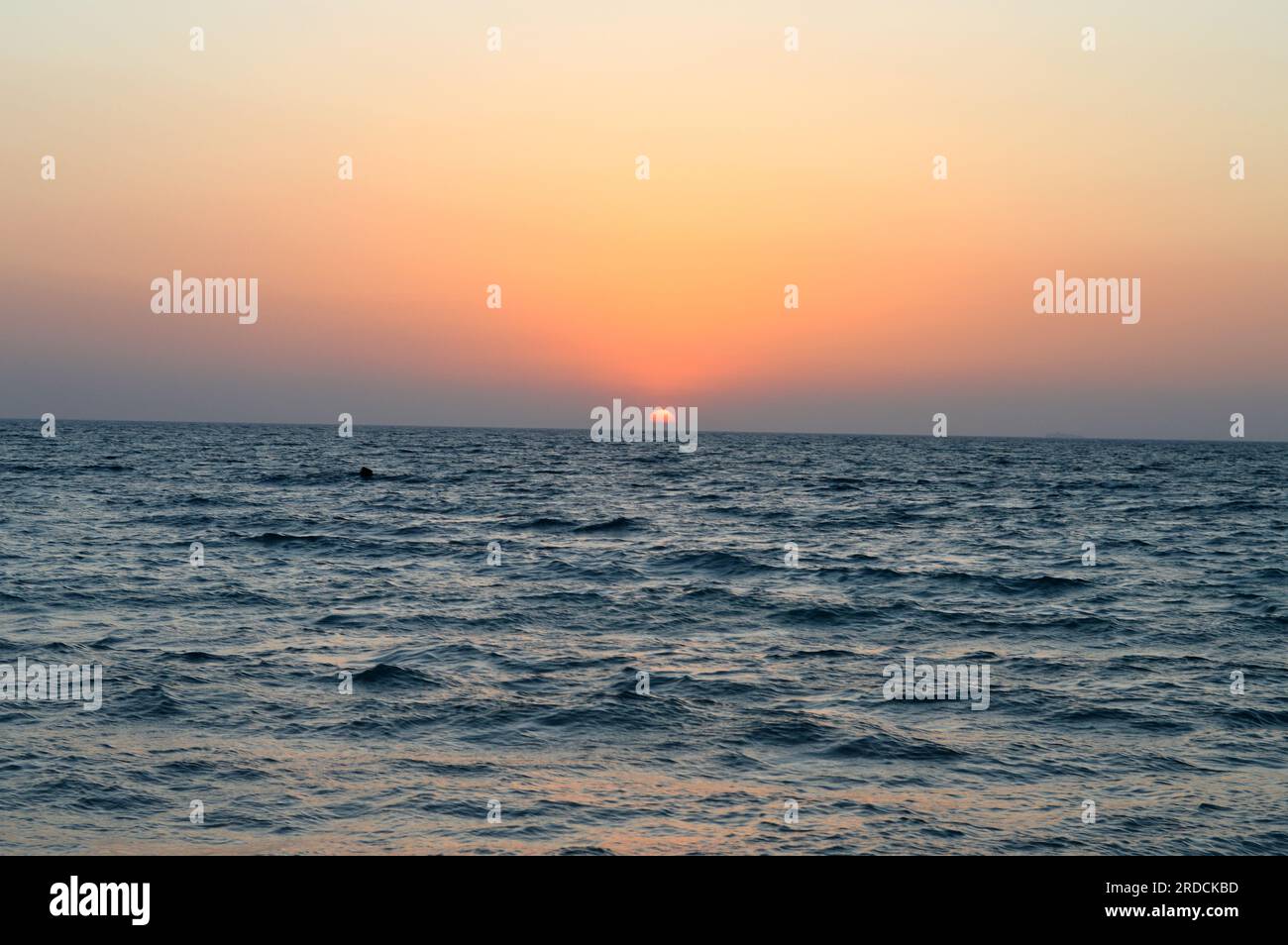Scenic sunset on the south Sinai beach, sun going down before night at ...