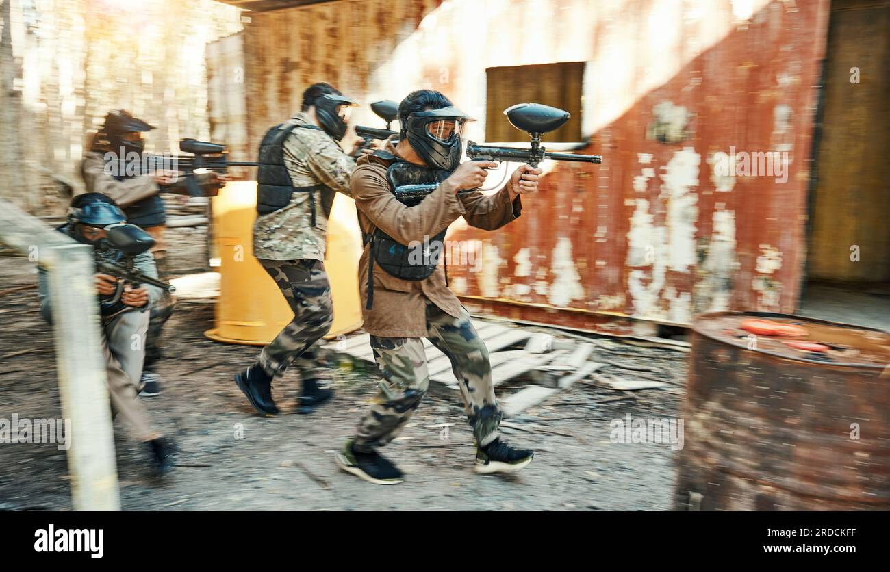 Teamwork, gaming and paintball with man in game for playground, war and ...