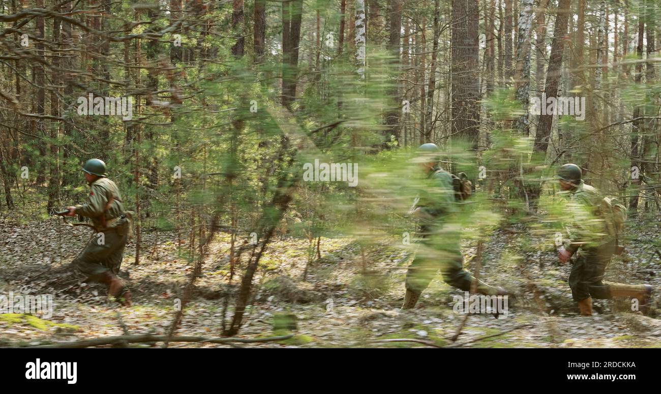 American Soldiers Of USA Infantry Of World War II Marching Running Run Along Forest In Autumn ...
