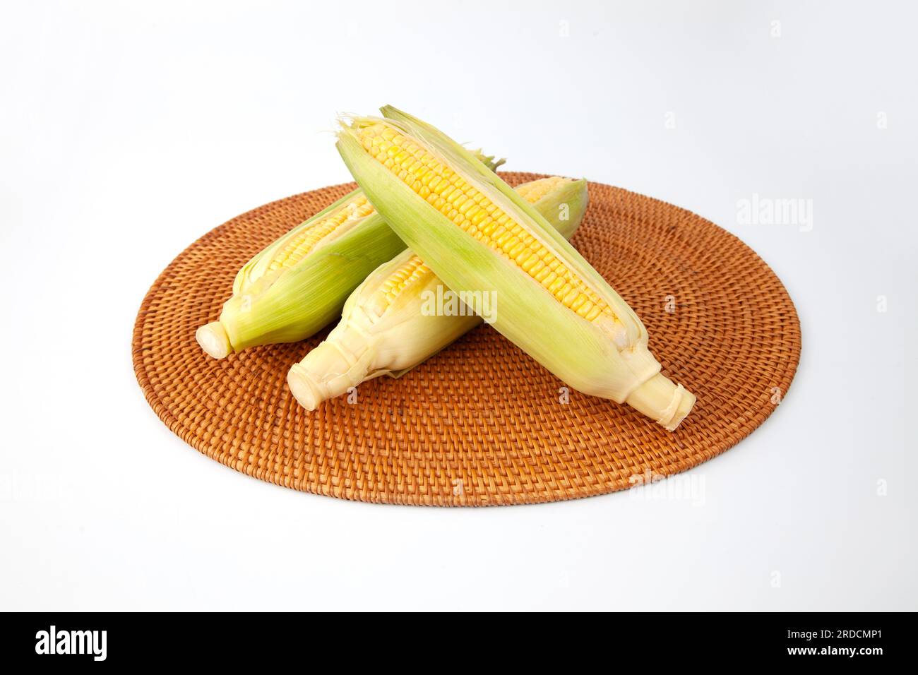 raw corn maize cob isolated on white background Stock Photo - Alamy