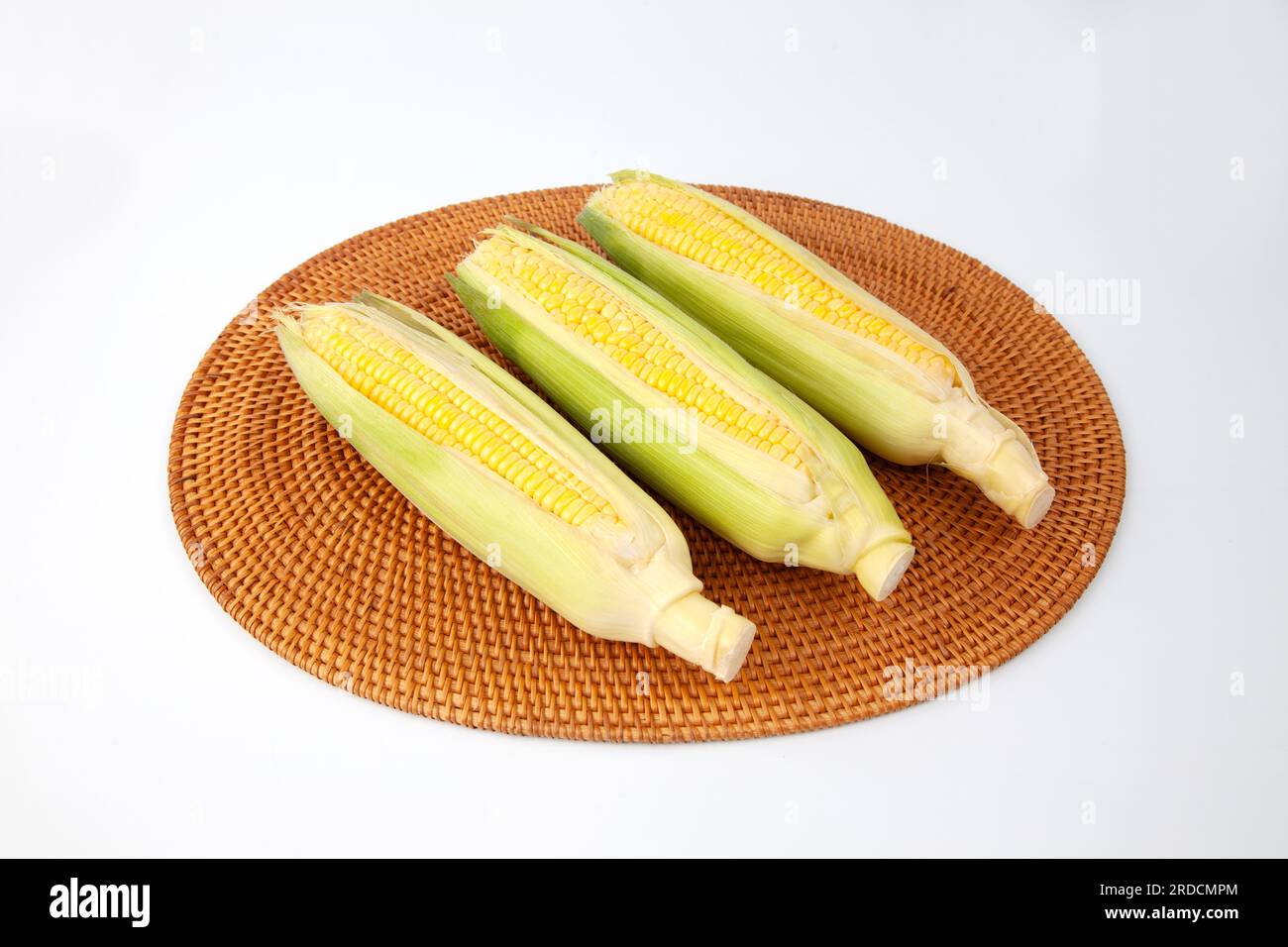 raw corn maize cob isolated on white background Stock Photo - Alamy