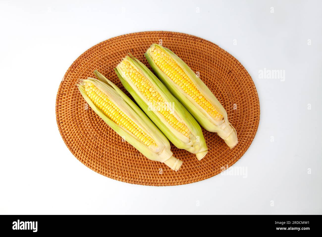 raw corn maize cob isolated on white background Stock Photo - Alamy