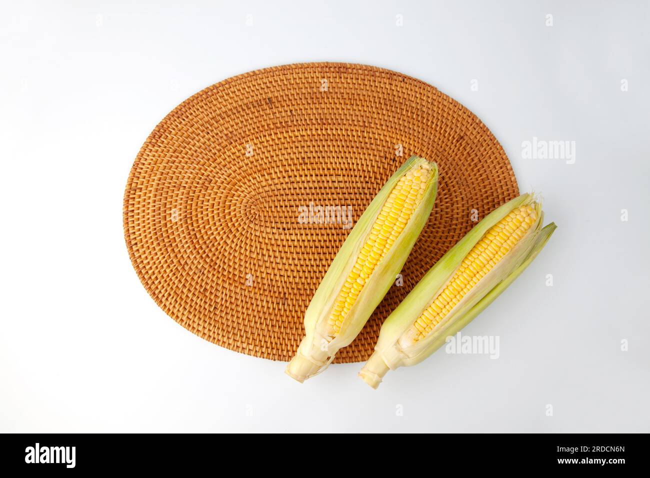 raw corn maize cob isolated on white background Stock Photo - Alamy
