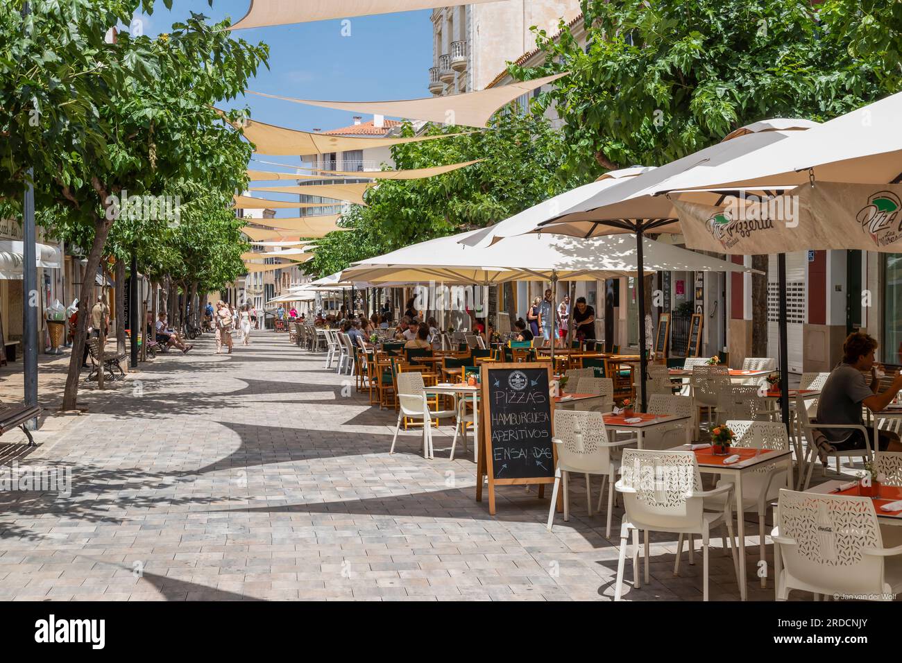 Cozy street with many terraces and restaurants in the center of the ...