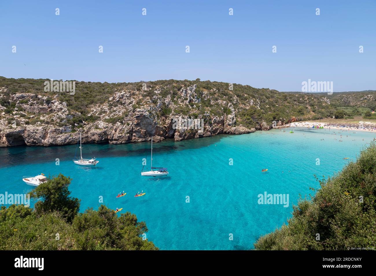Sea bay near the village of Cala en Porter on the Spanish island of ...
