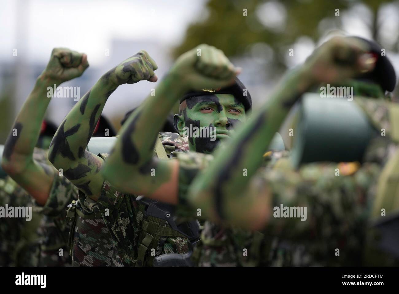 Soldiers march in the Independence Day military parade in Bogota ...
