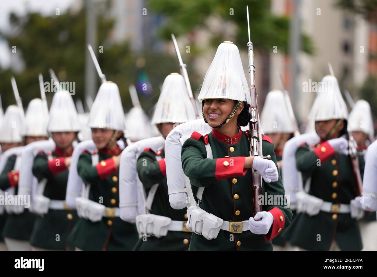 Female cadets march in the Independence Day military parade in Bogota ...