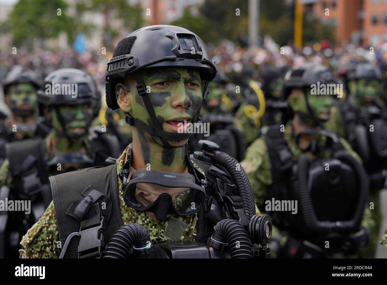 Soldiers march in an Independence Day military parade in Bogota ...