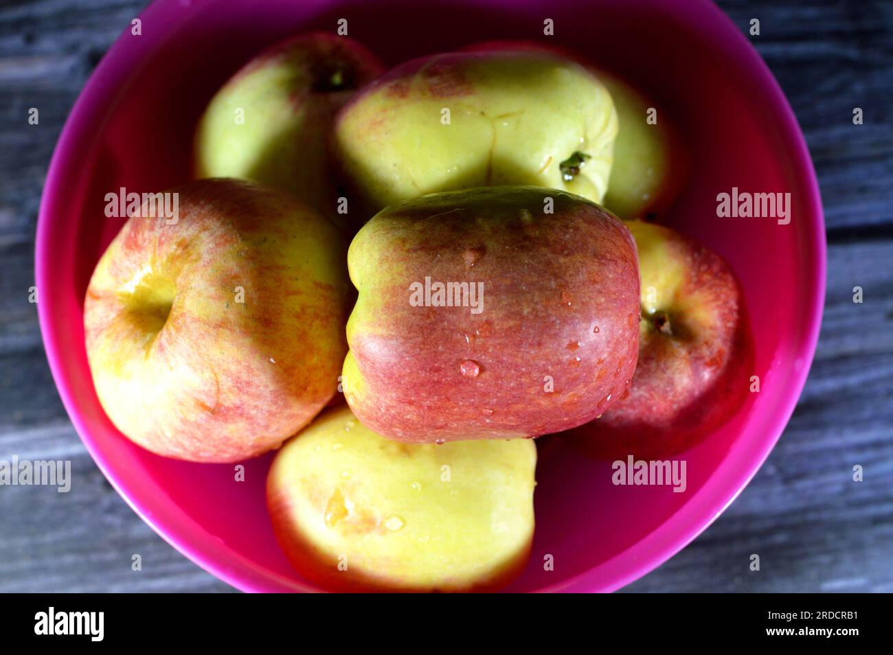 Bowl full of Egyptian fresh Apples, An apple is a round, edible fruit ...