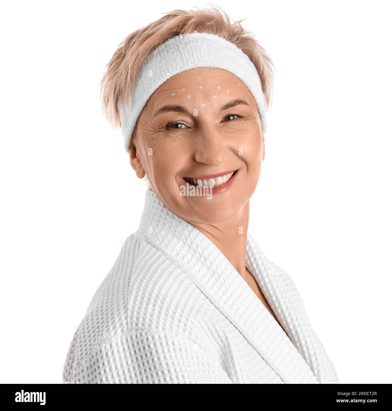 Mature woman with marked face for filler injections on white background ...