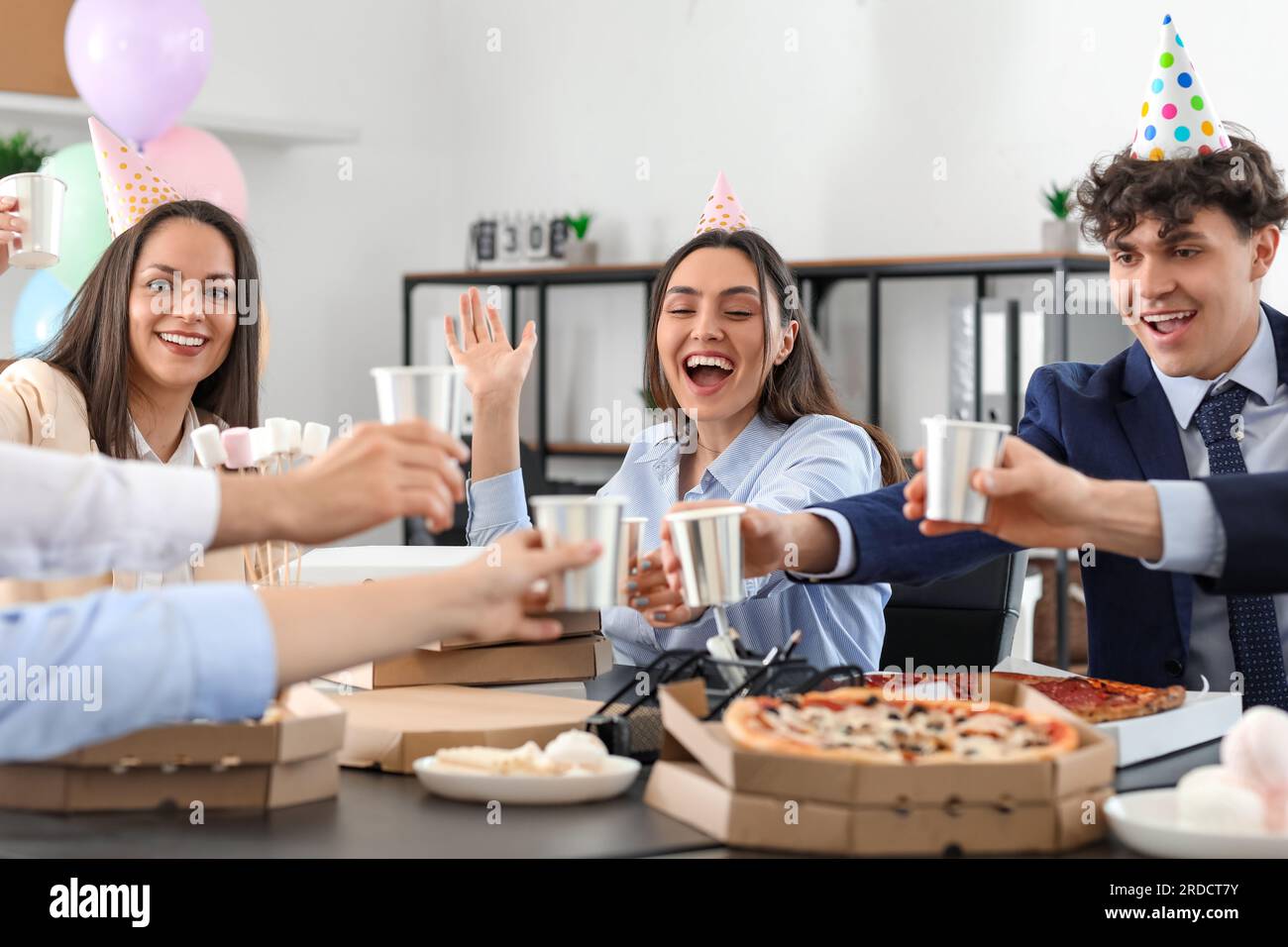 Group of business people drinking at birthday party in office Stock ...