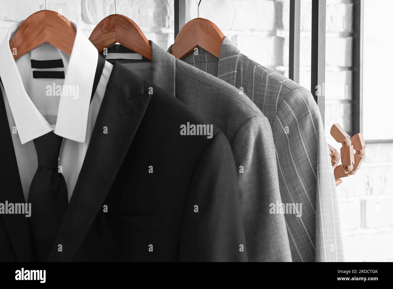 Suits hanging hi-res stock photography and images - Alamy