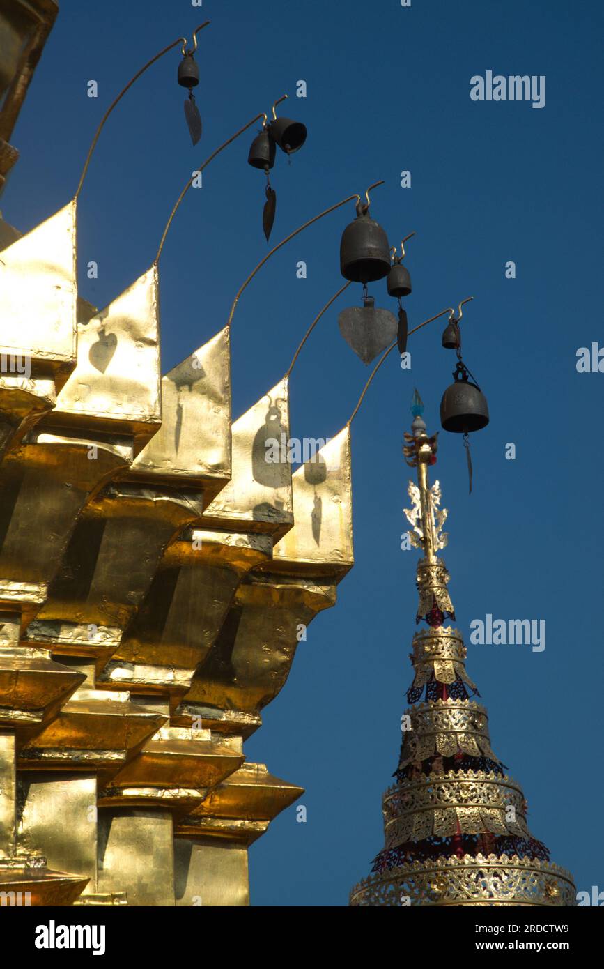 Golden tiered umbrella and the corner of golden Buddhist pagoda in Wat ...