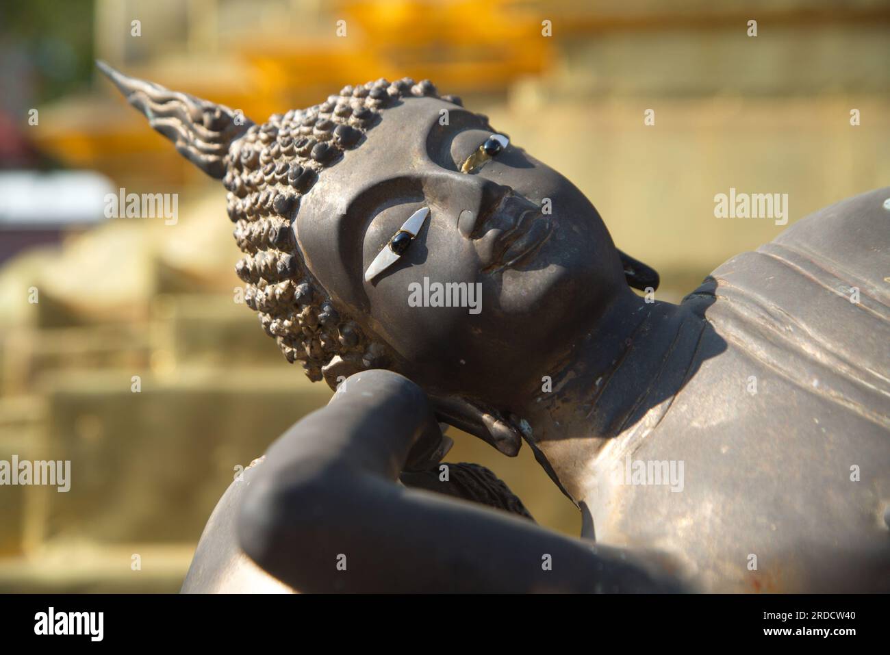 Outdoor bronze reclining Buddha image enshrined at Phra Chedi Chai ...