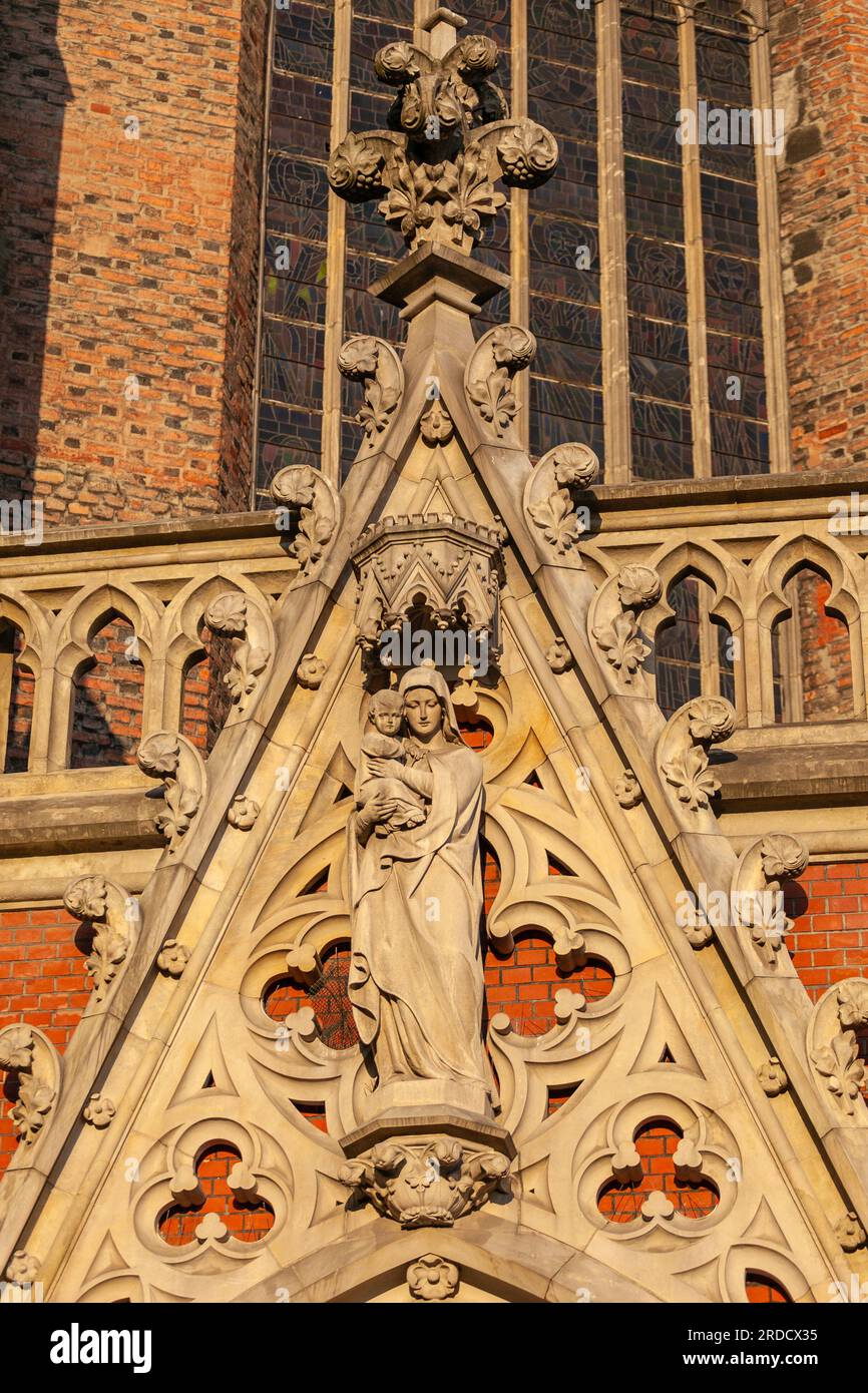 The statue of the Mother of God with the Child above the entrance to ...