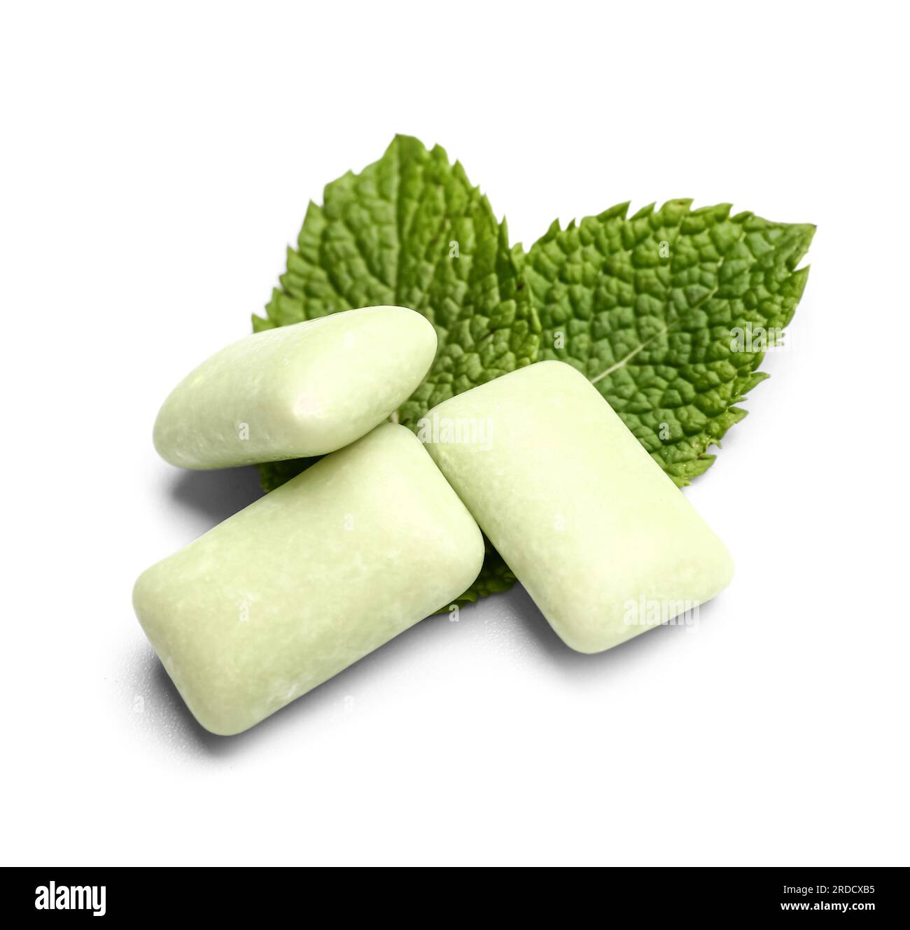 Fresh chewing gums with mint on white background Stock Photo - Alamy