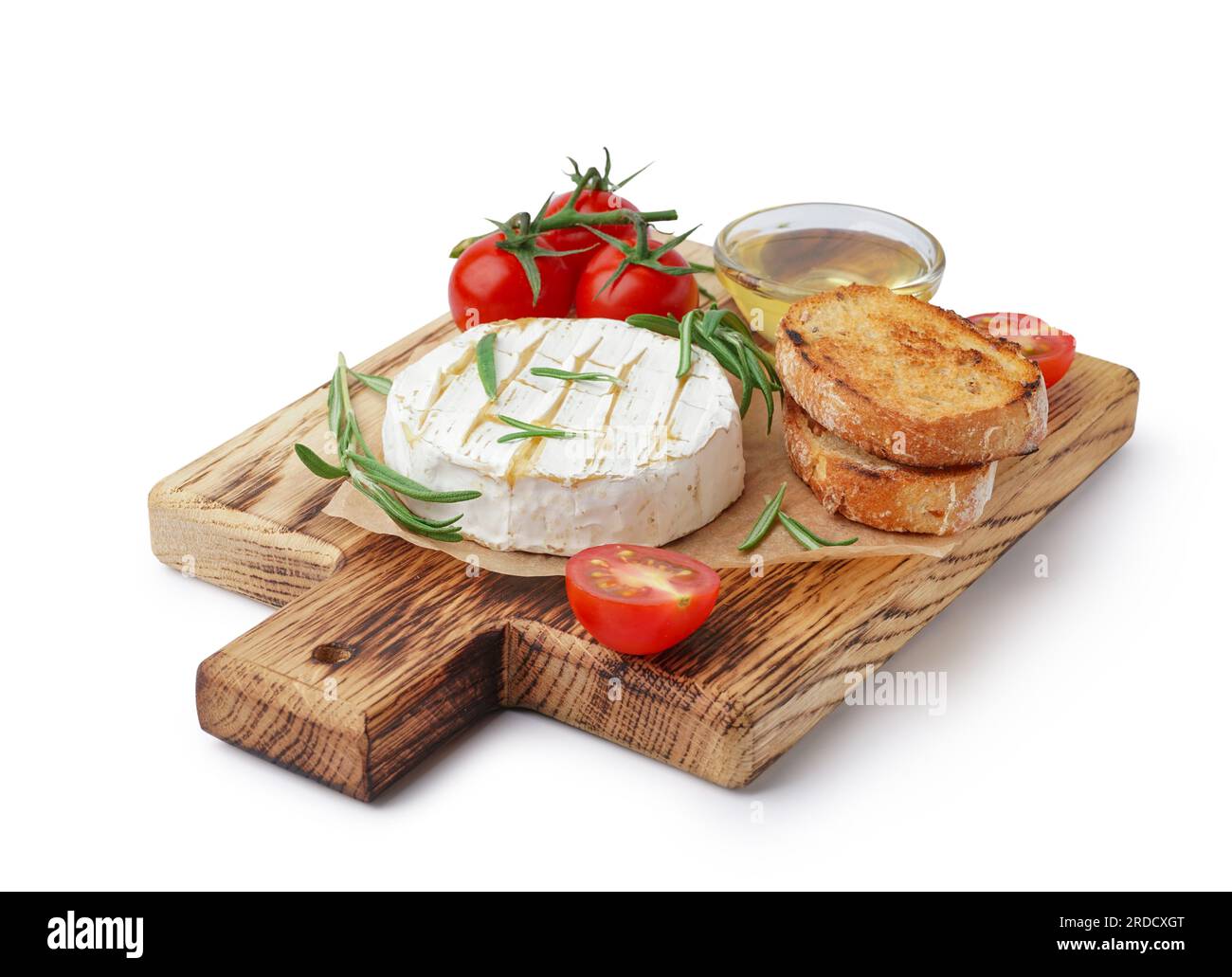Wooden board with tasty baked Camembert cheese on white background ...