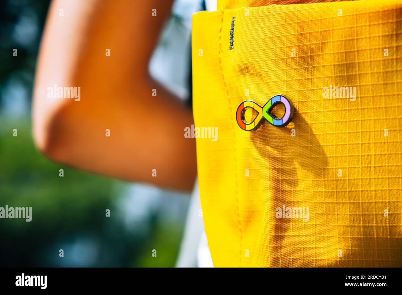 Kid with backpack with autism infinity rainbow symbol sign. World ...